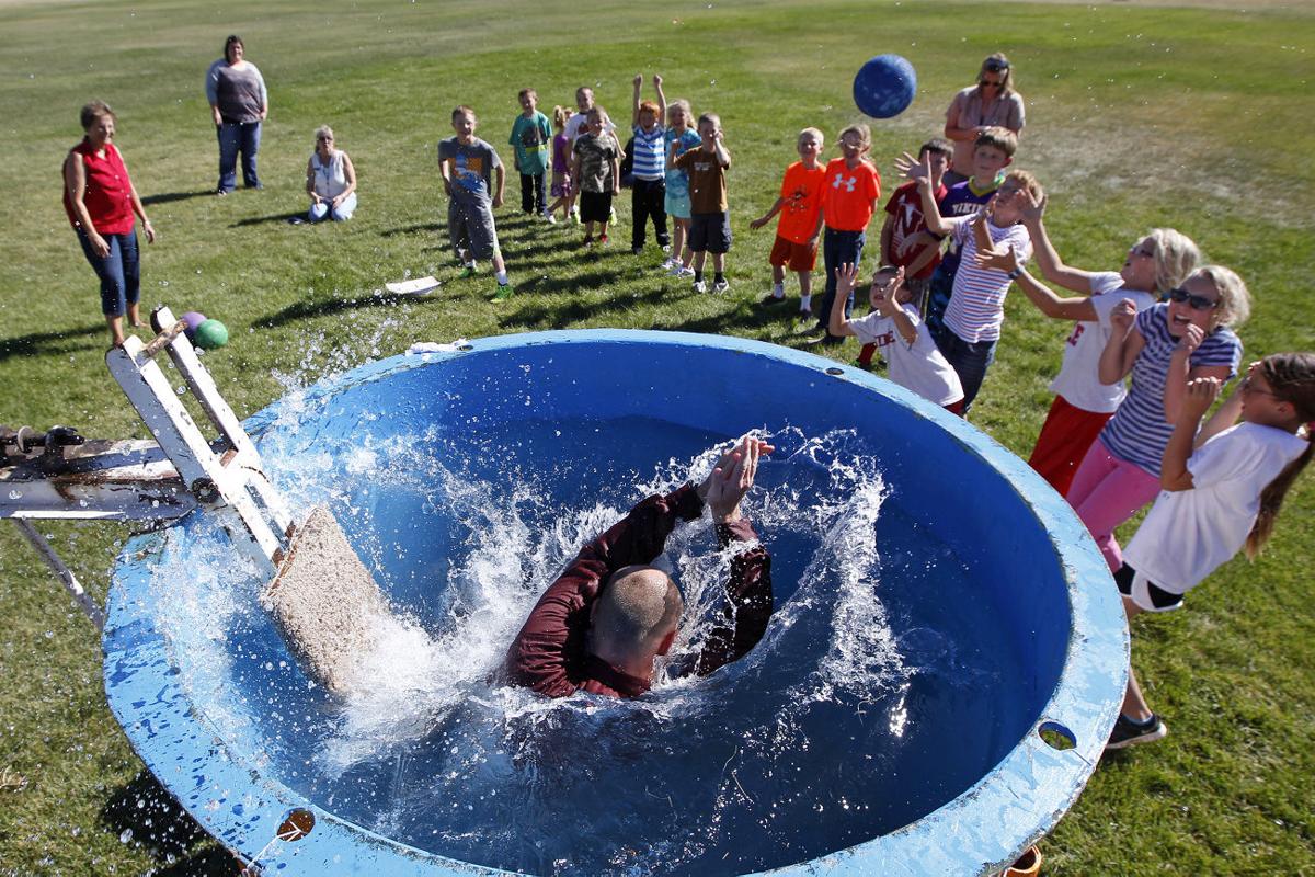 Principal endures cold dunks to encourage 4-J students to read | Local ...