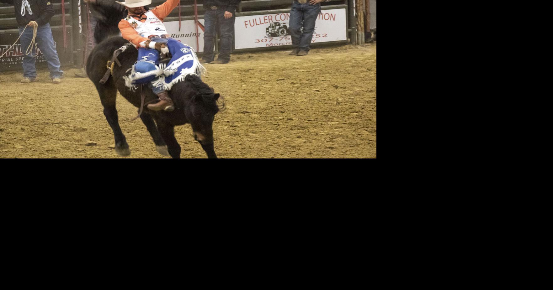 Rodeo athletes give packed room a show at New Year's Eve Buck and Ball ...