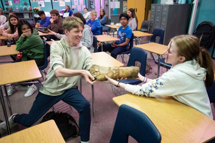 Dino-mite!: Twin Spruce students dig into dino bones | Local News ...