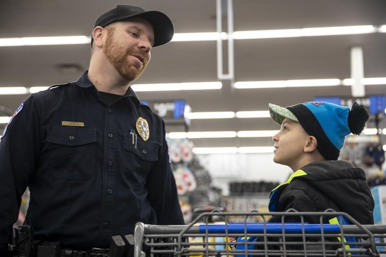 Cops spread Christmas cheer at annual shopping spree | Local News ...