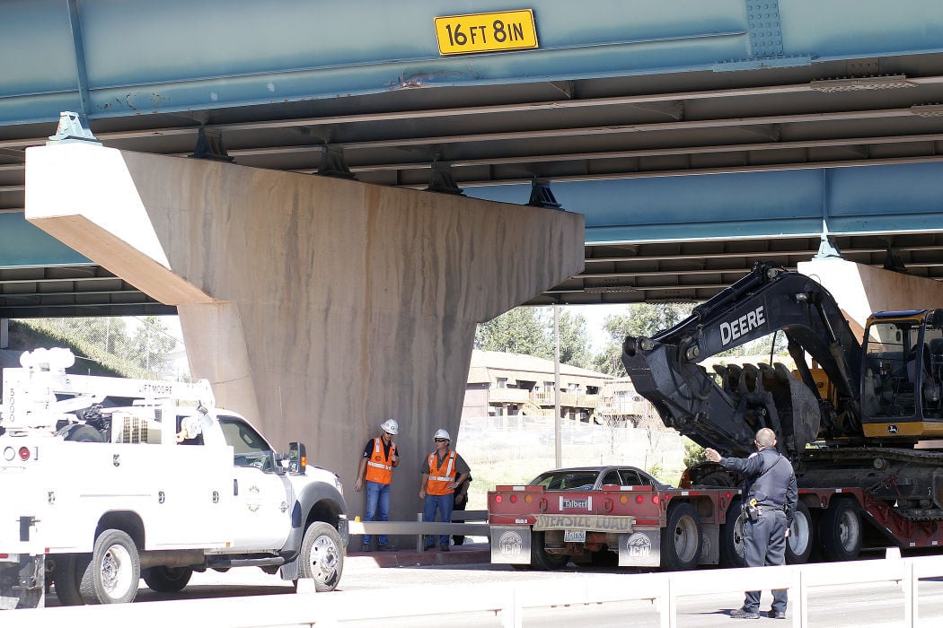 I-90 overpass struck, significantly damaged by loose equipment | Local ...