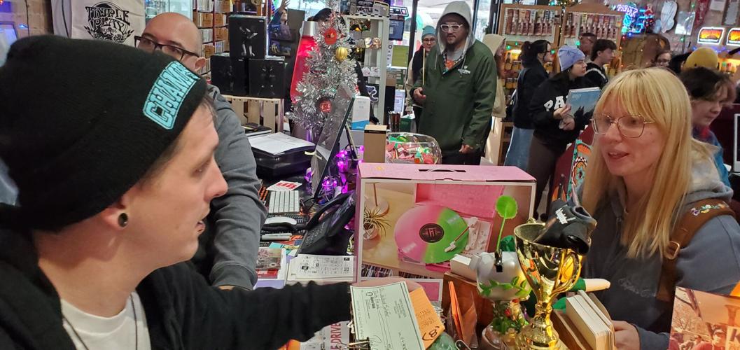 Scores line up outside Triple Play Records for Black Friday, seeking ...