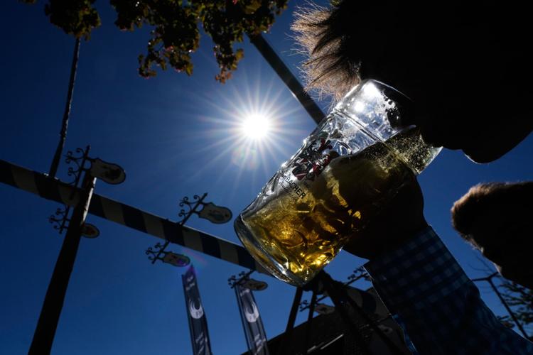 Beer, music and shouts of 'Hau-Ruck' as a Bavarian village raises its ...