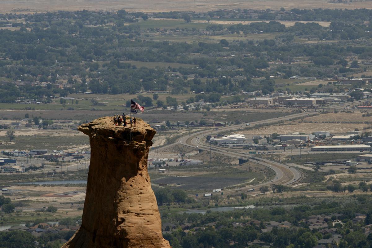 Patriotic climbers follow tradition as old as Colorado National ...