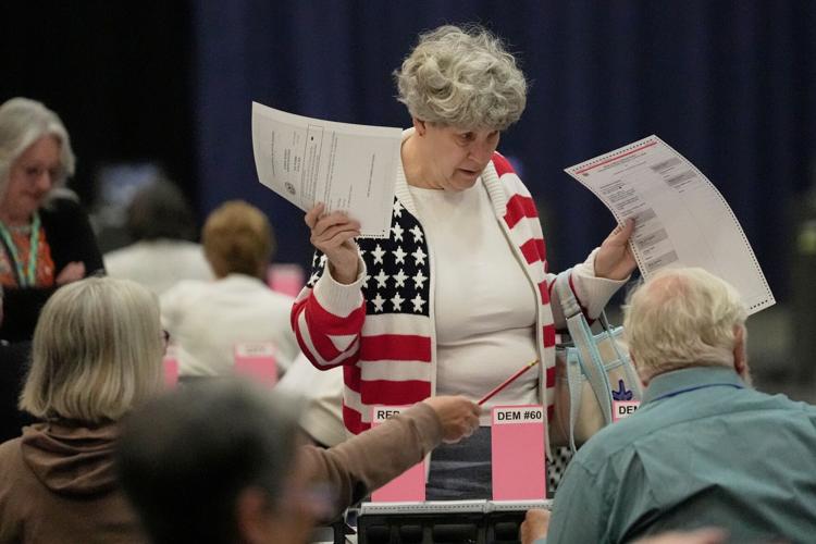 Photos of primary elections across four states | U.S. | gjsentinel.com