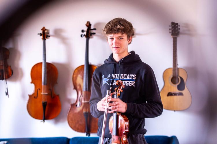 'One of a kind': Teen violinist hears, plays uniquely with cochlear ...