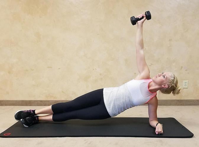 side plank exercise with weights