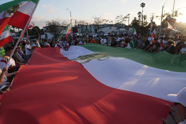 Iranian Americans protest for change outside Iran's World Cup match, in ...