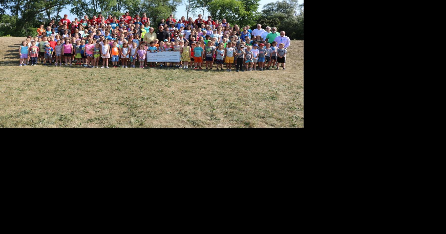 Russ Darrow Group donates to YMCA to help kids attend camp | Washington ...