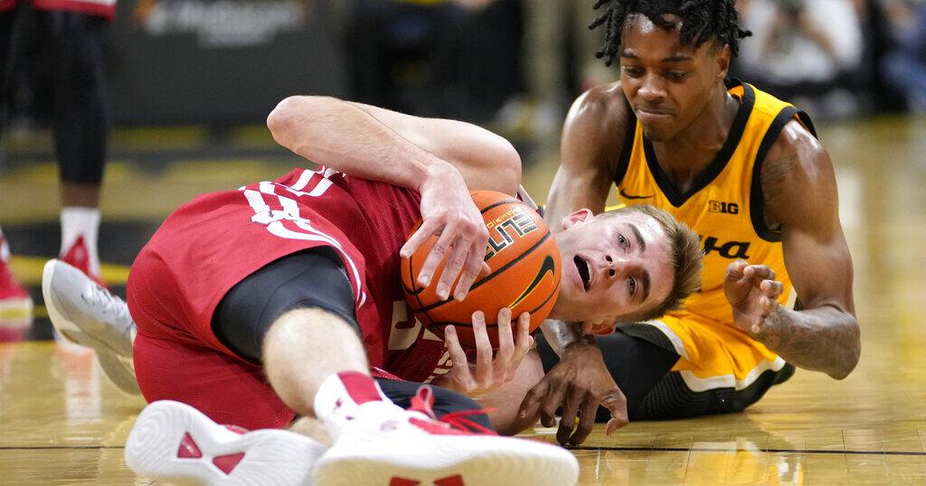 Wahl sparks Wisconsin to 78-75 victory over Iowa in overtime ...