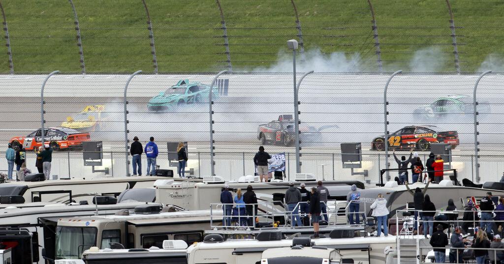 Larson edges Buescher at the line at Kansas Speedway in closest finish ...