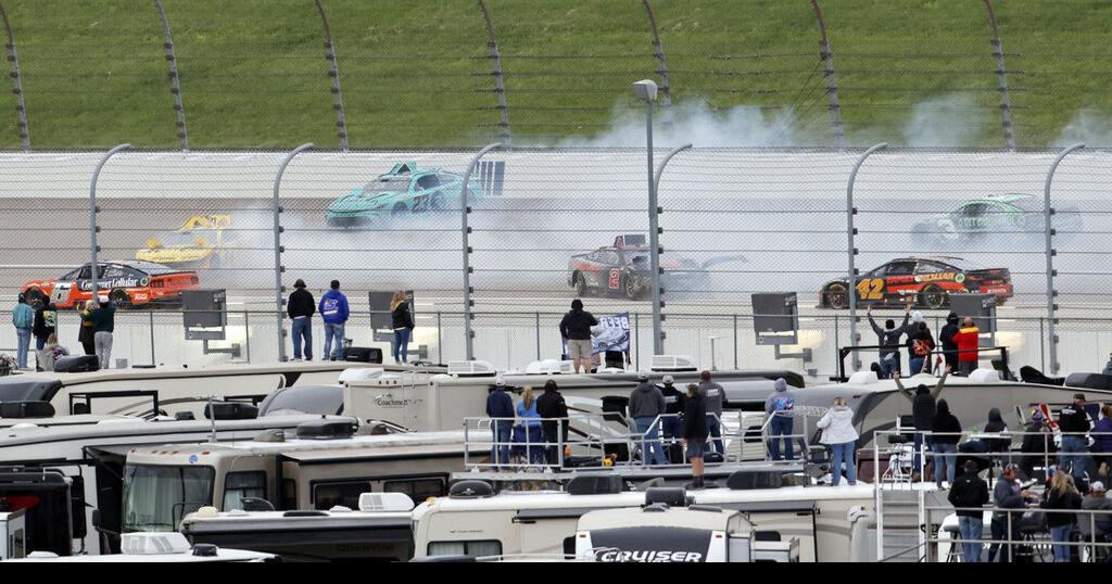 Larson edges Buescher at the line at Kansas Speedway in closest finish ...