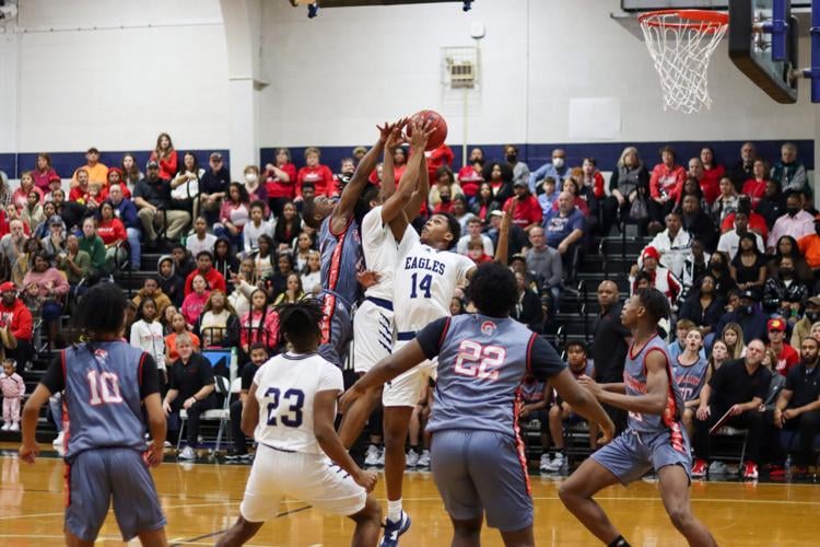 Tunstall survives madness, holds on to 60-58 victory over GW to capture ...