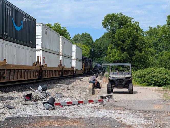 Train, car hauler collide in Danville