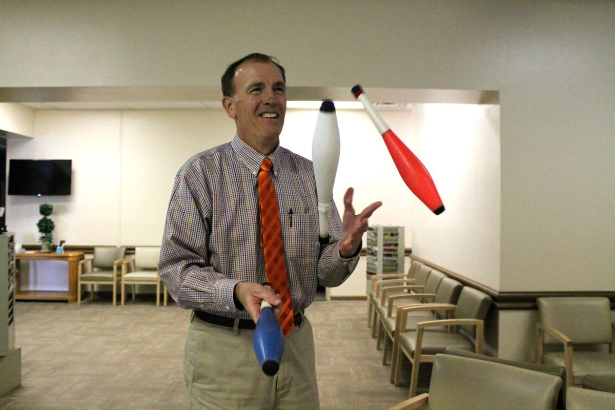 Local doctor perfects his skill at juggling while jogging