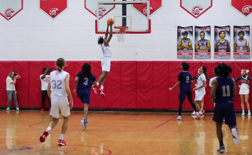 Trojans hold down Eagles in Piedmont District action