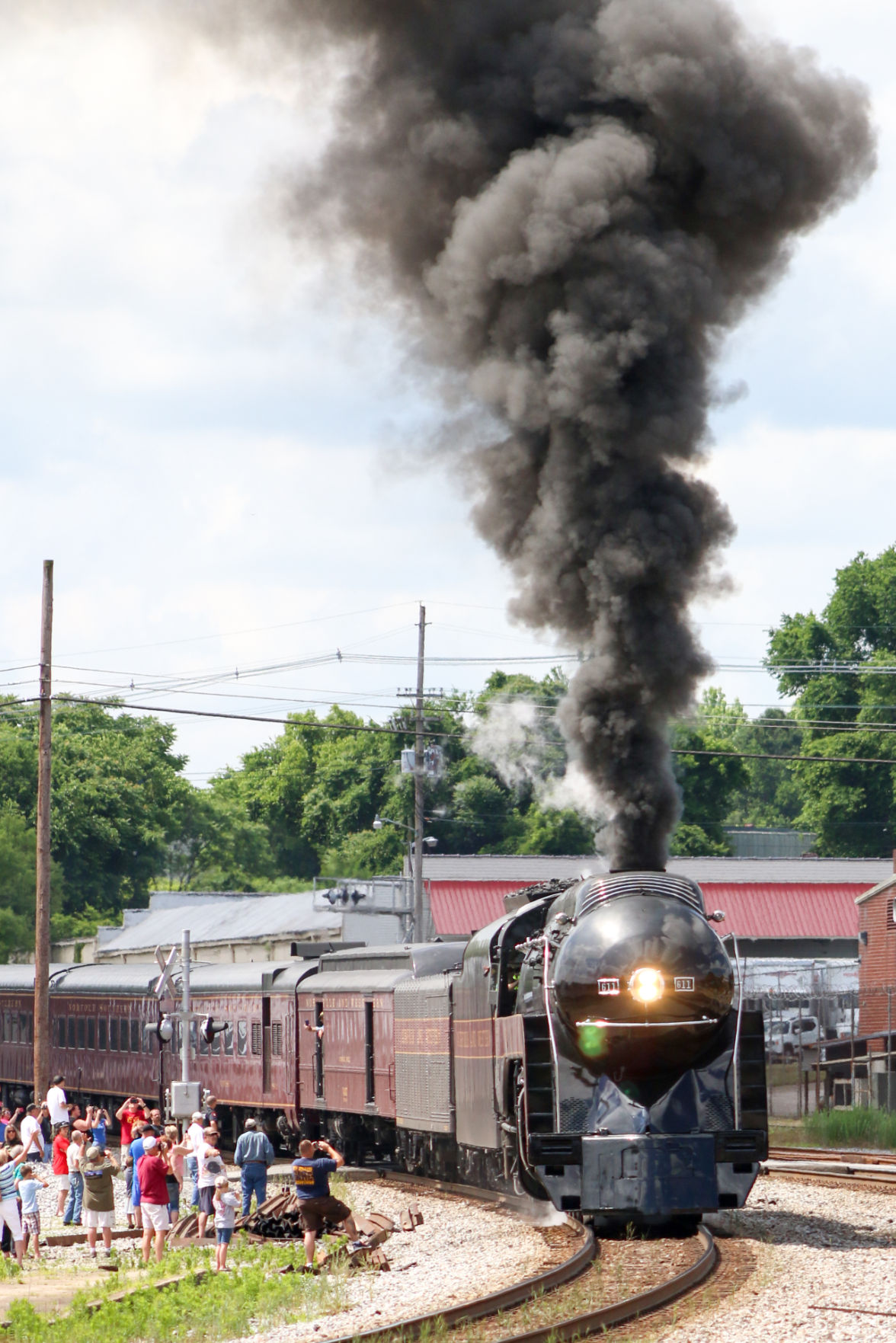 Powerful steam locomotive heads home