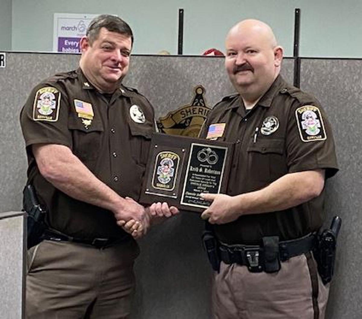 Deputy presented retirement plaque