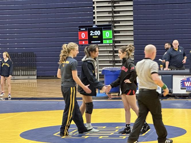 Bucs win historic first home girls wrestling dual on National Girls ...
