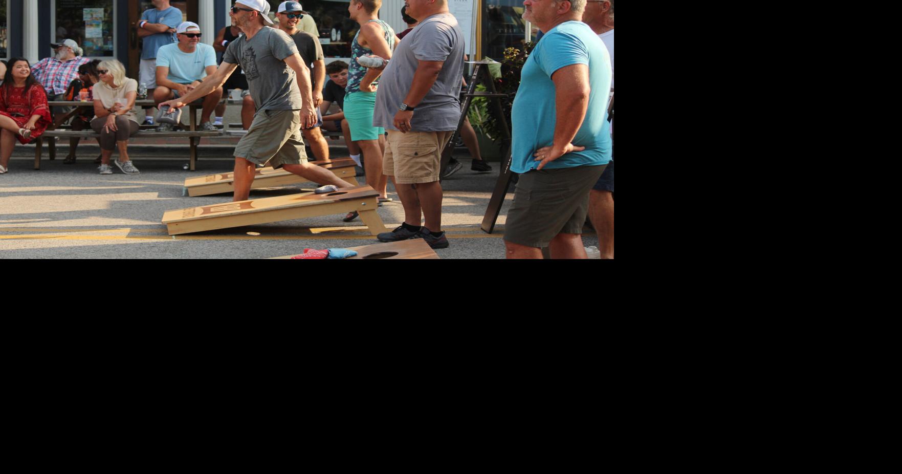 Bags fly at cornhole tournament | Fairs & Festivals | grandhaventribune.com