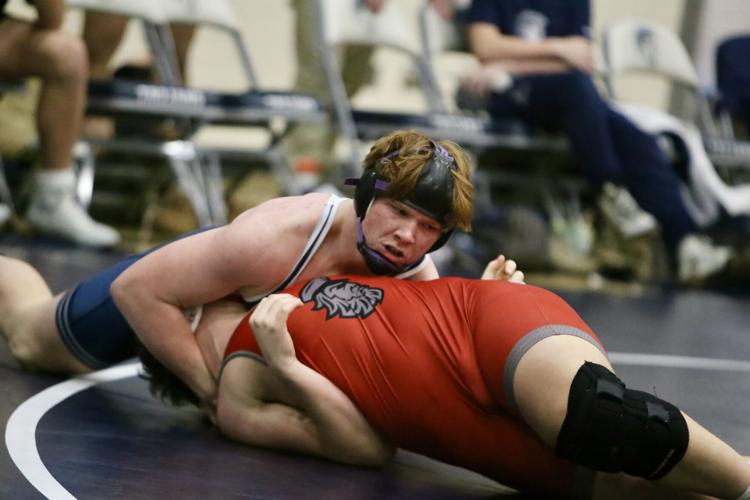 Local wrestlers qualify for regionals | Sports | grandhaventribune.com