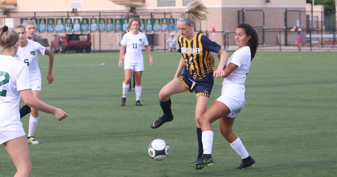 Bucs struggle through heat, but keep cool to top Jenison | Sports ...