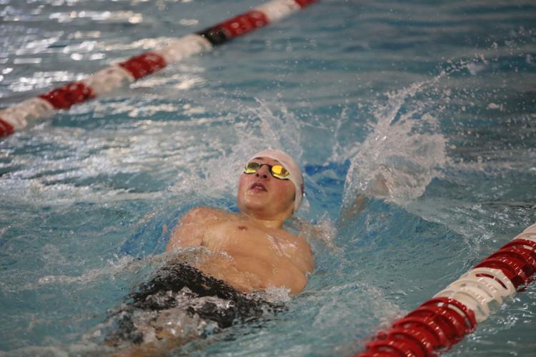 Laker swim and dive defeat competition, sickness ahead of holiday break ...
