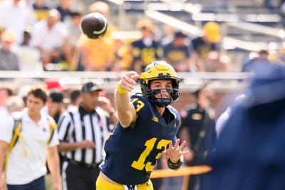 Michigan quarterback battle remains a 'fluid operation' | Sports ...