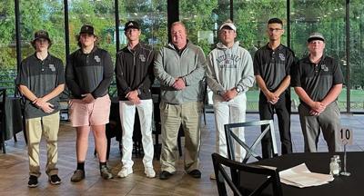 Cougars golf team bring home a pair of championships