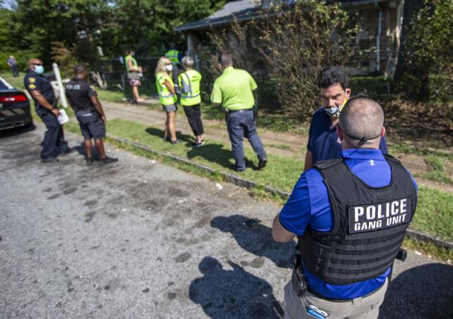 Photos: High Point police canvass neighborhood