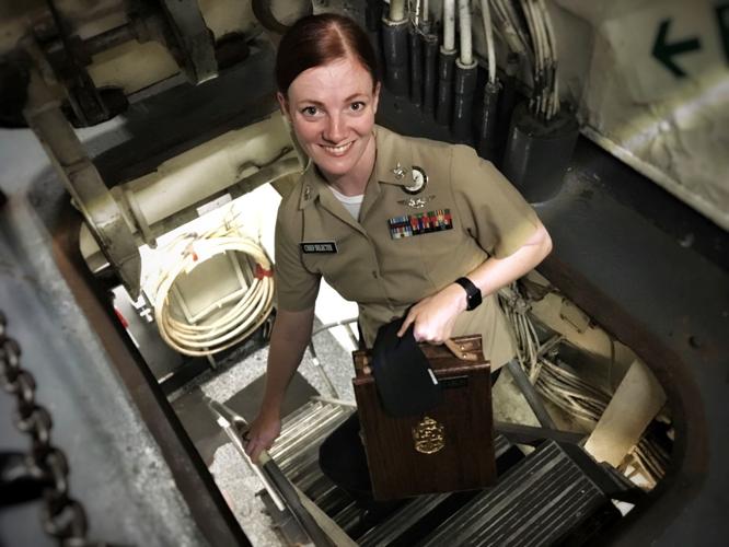 Elizabeth Carlin wears a different uniform outside of UNCG
