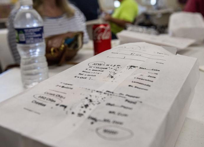 For years, a church's 'Hot Dog Tuesday' has been where Greensboro meats ...