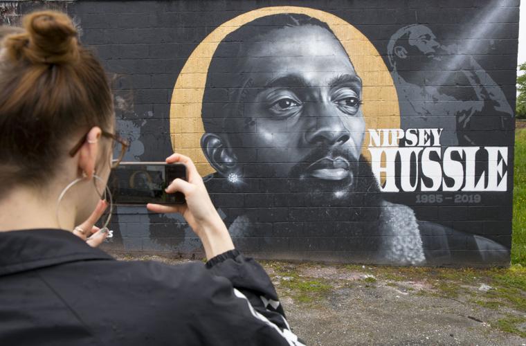 Nipsey Hussle mural drawing people to Greensboro business to take ...