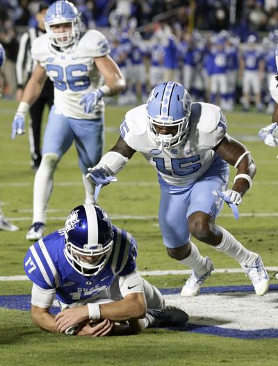 Victory Bell tolls for Blue Devils after holding off No. 15 Tar Heels