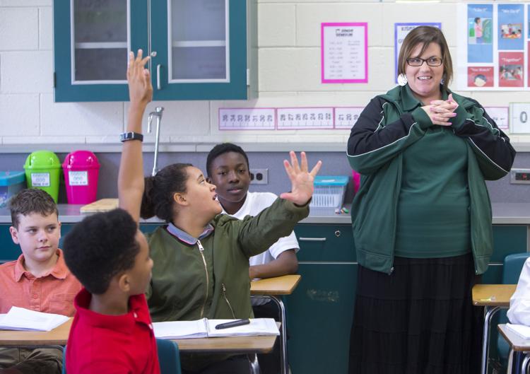 Structure, support help Kiser Middle reach 'Triple Crown' (Video)