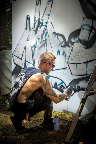 JEKS's spray-painted murals part of city's growing street-art scene