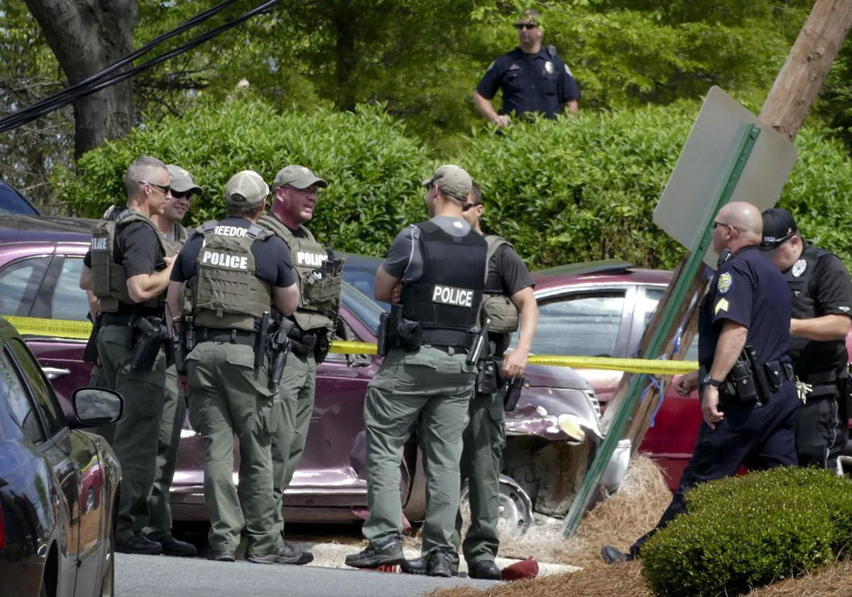 Photos: Police chase of suspect in officer assault ends in crash