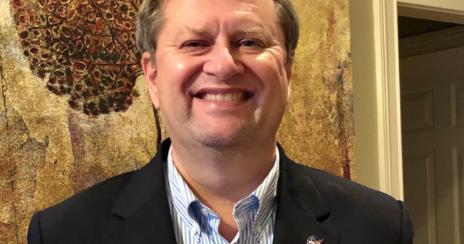 A UNCG dean wins a scientific medal and gets his name on an asteroid