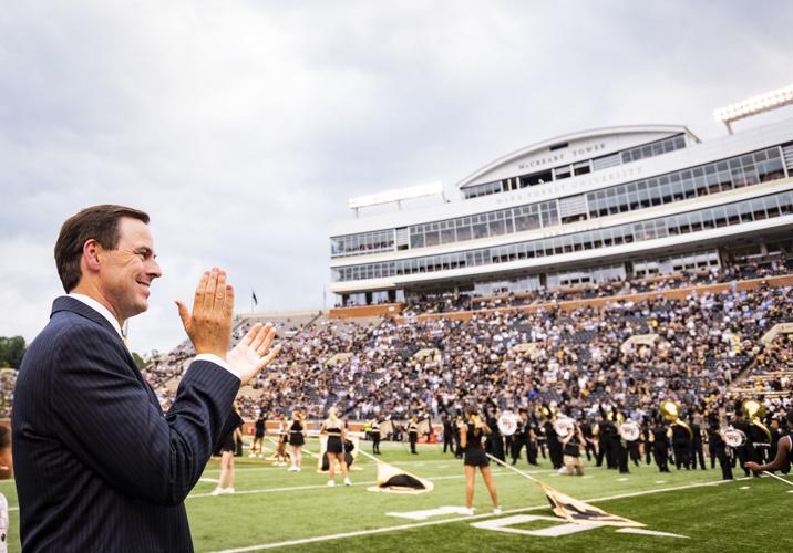 Wake Forest's John Currie, Dave Clawson, during videoconference with ...