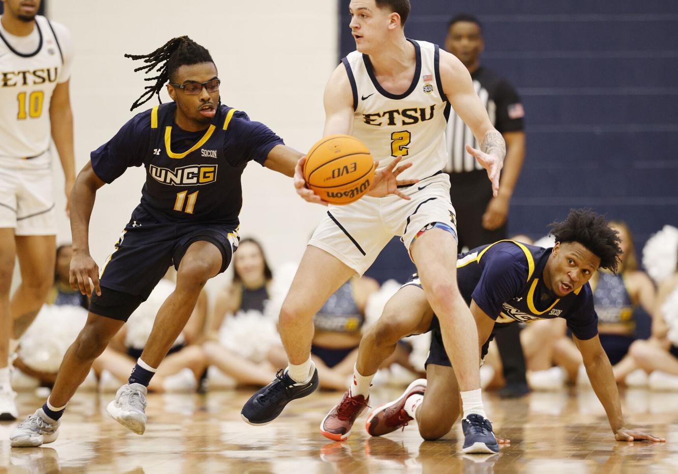 Late baskets by Kenyon Giles helps UNC Greensbioro beat ETSU