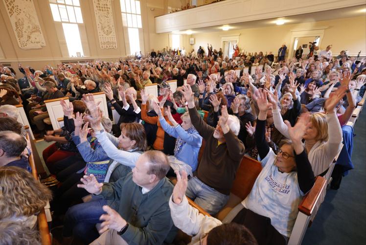 Town hall moves forward despite Sen. Thom Tillis' absence