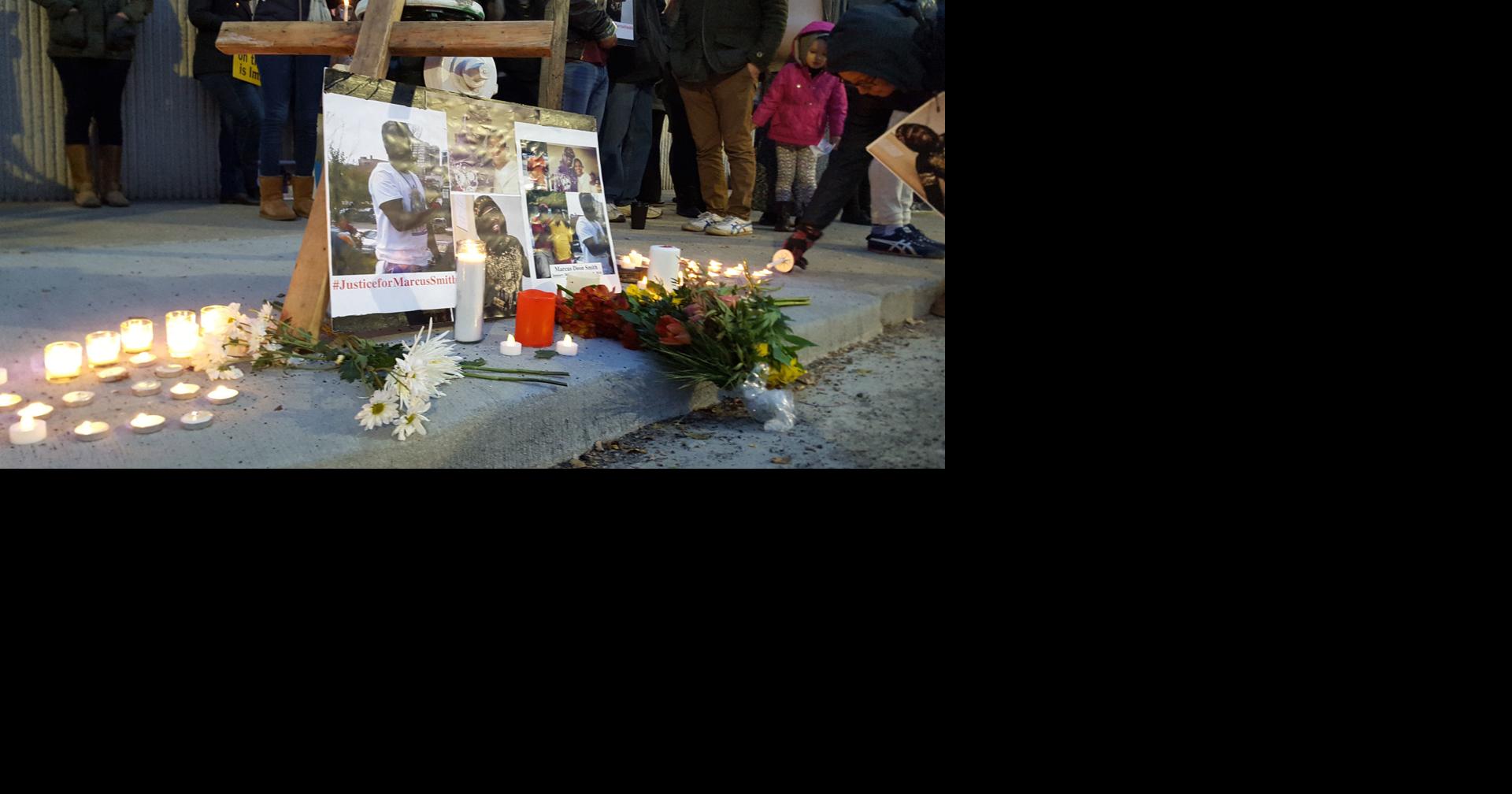 Crowd gathers downtown for vigil for Marcus Deon Smith