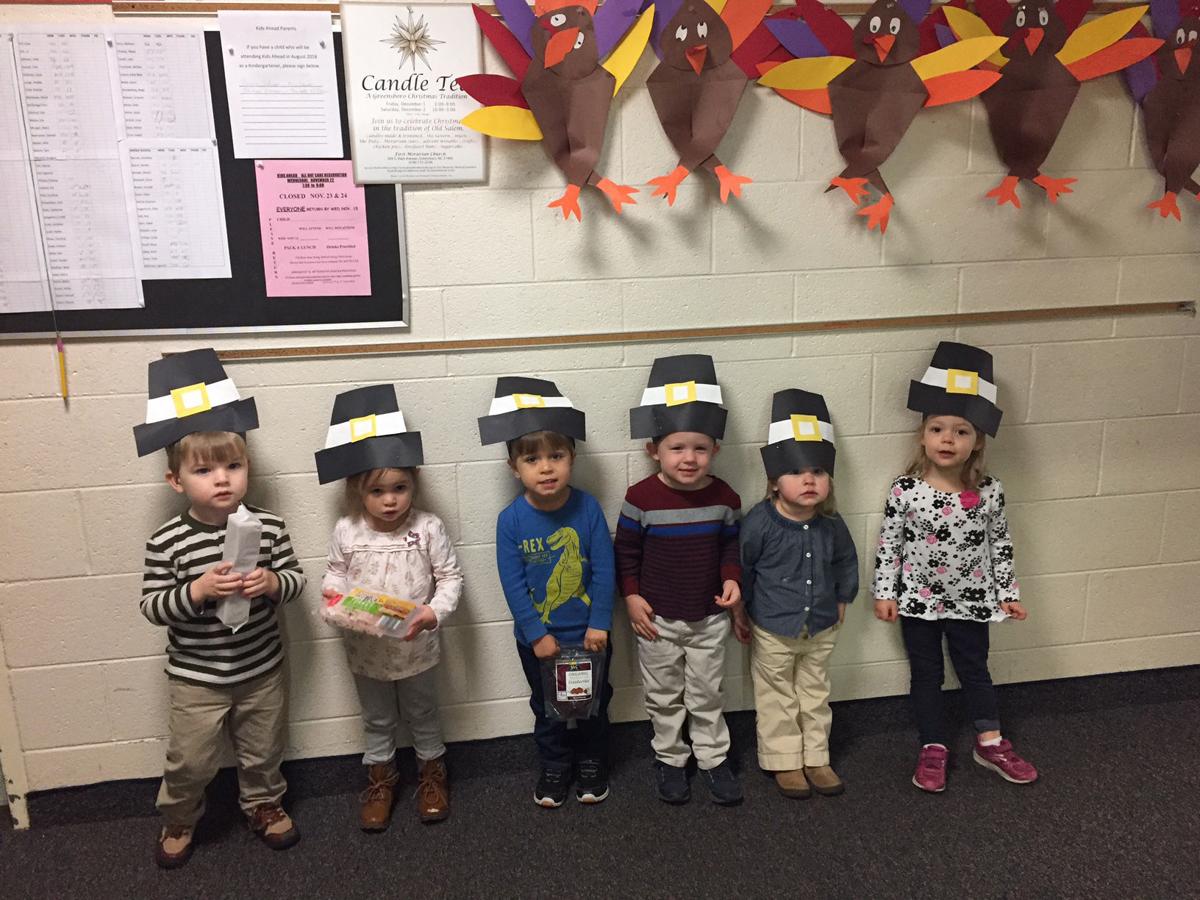 SIX LITTLE PILGRIMS ALL IN A ROW