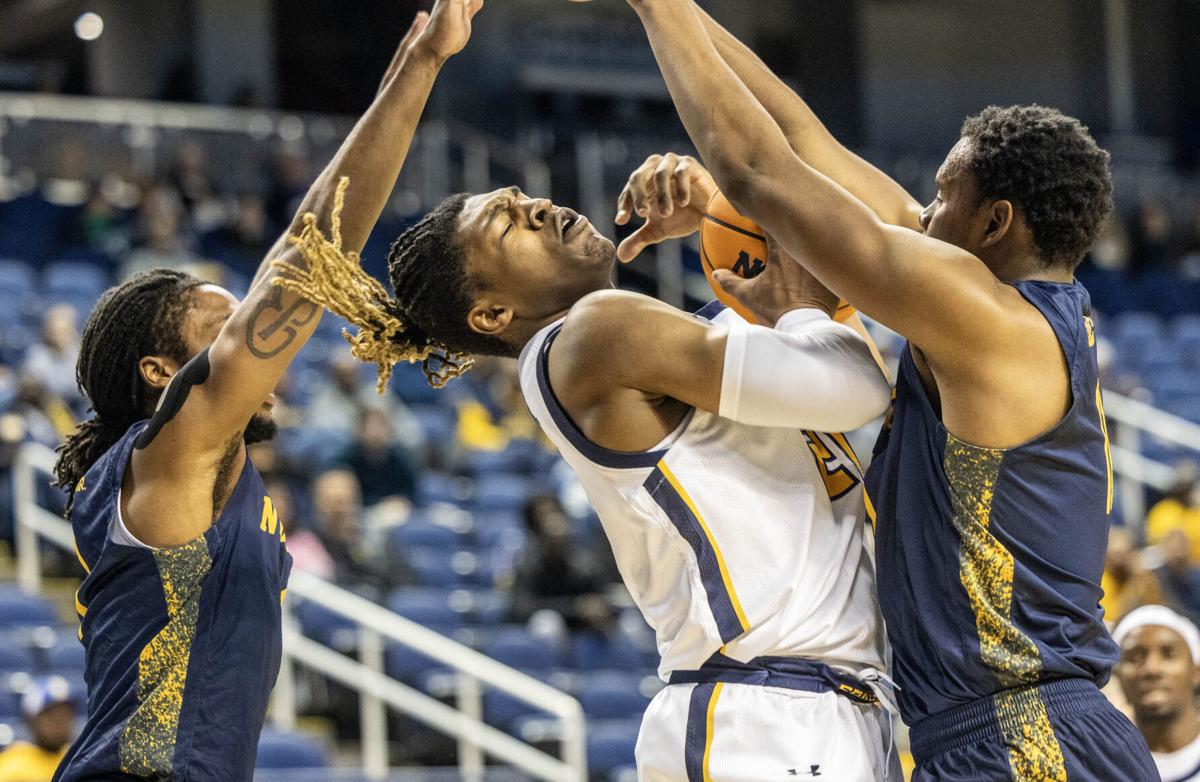 North Carolina A&T withstands rally to beat UNC Greensboro