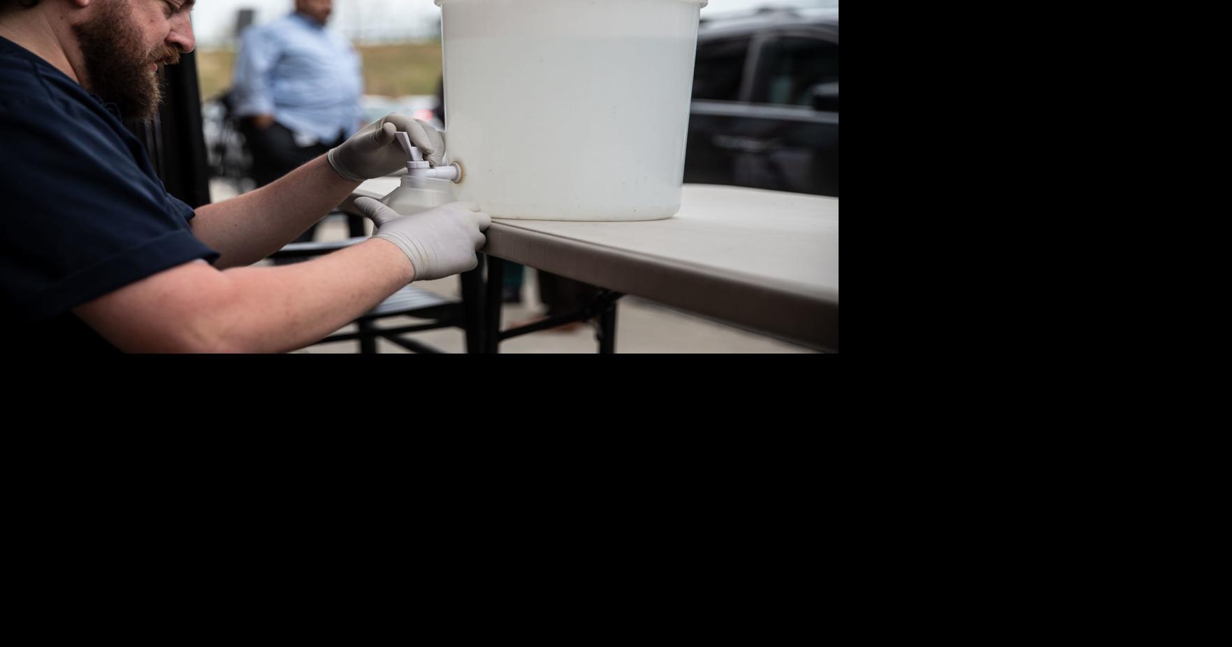 Photos: Fainting Goat Spirits gives out free hand sanitizer