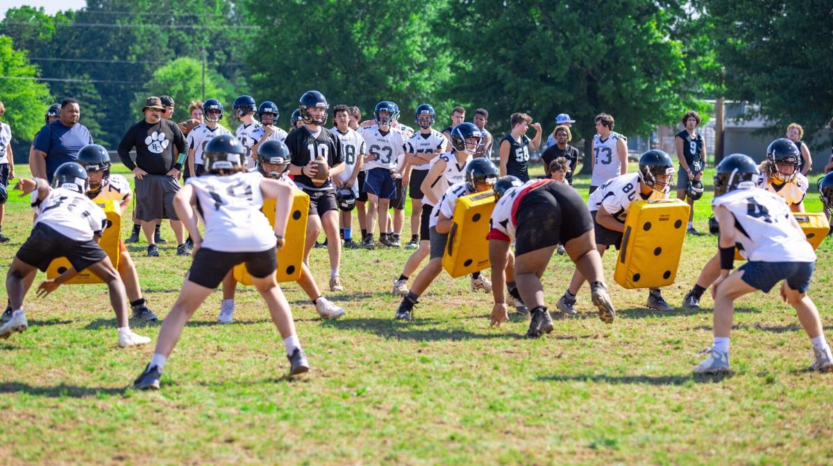 New coaches and vets lead county football teams through voluntary summer workouts