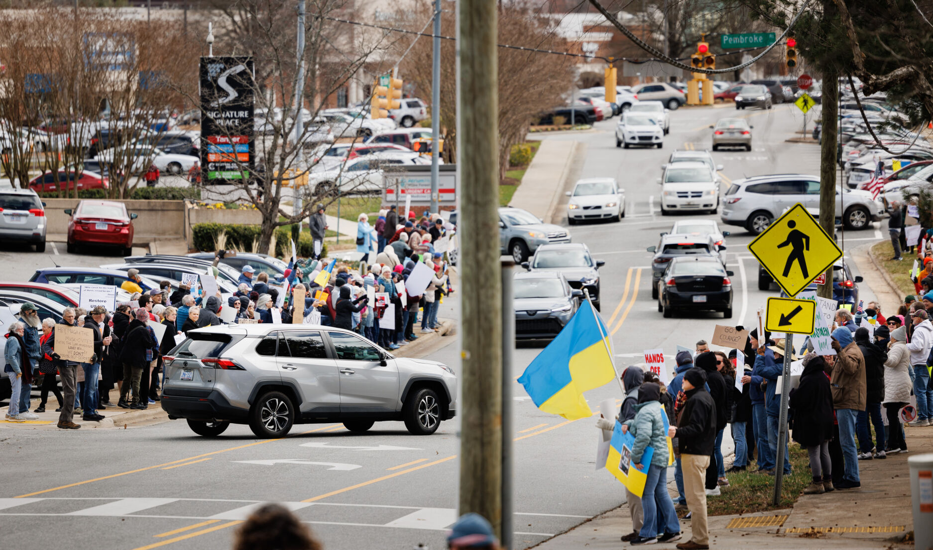 Tillis calls out at protestors removed from office building