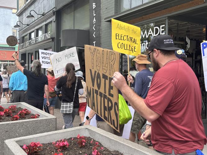 Protesters rally in support of voting rights in Greensboro