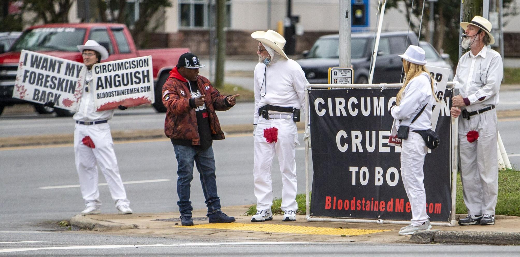 Photos: Group protests circumcision in Greensboro