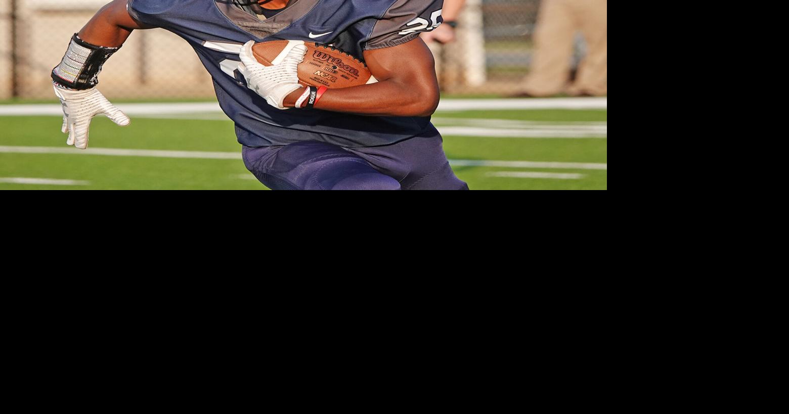 SPALDING FOOTBALL: Jags, Red Devils battle to 14-14 tie | Sports ...